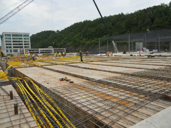 The Rise of Elevated, Post-Tensioned Concrete Slab Systems - Beyond the ...
